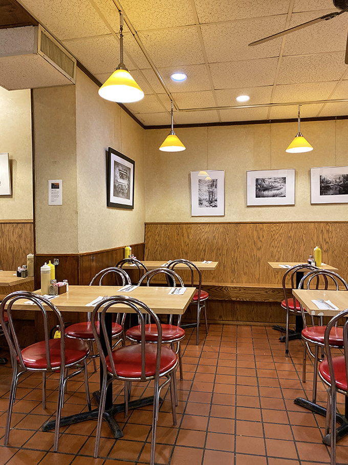 The dining room's lived-in charm comes from decades of conversations had over exceptional meals – you're not just eating, you're joining a tradition.