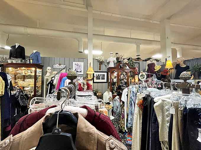 The vintage clothing section offers a wearable timeline of fashion history, where every garment carries the energy of its original era.