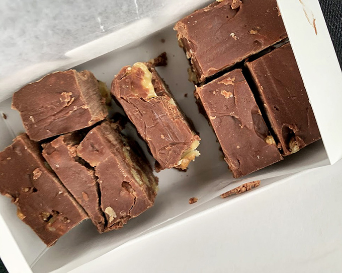 Walnut fudge squares showcase the perfect marriage of creamy chocolate and crunchy nuts – impossible to eat just one piece.