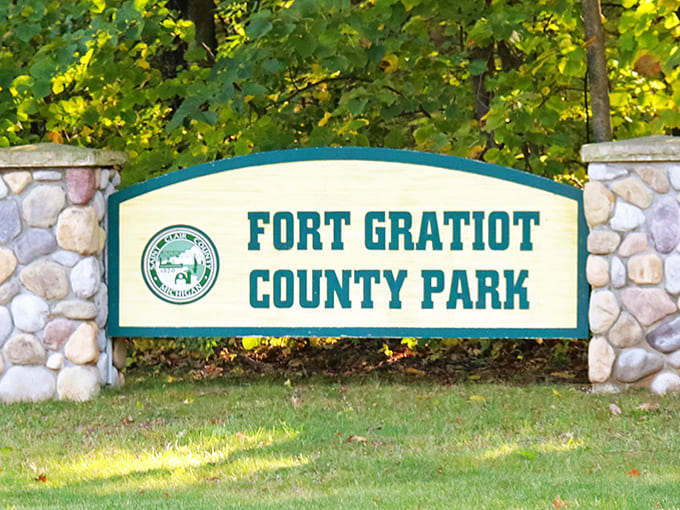 Fort Gratiot County Park's welcoming sign promises adventures ahead &ndash; the gateway to memories that will last far longer than your suntan.