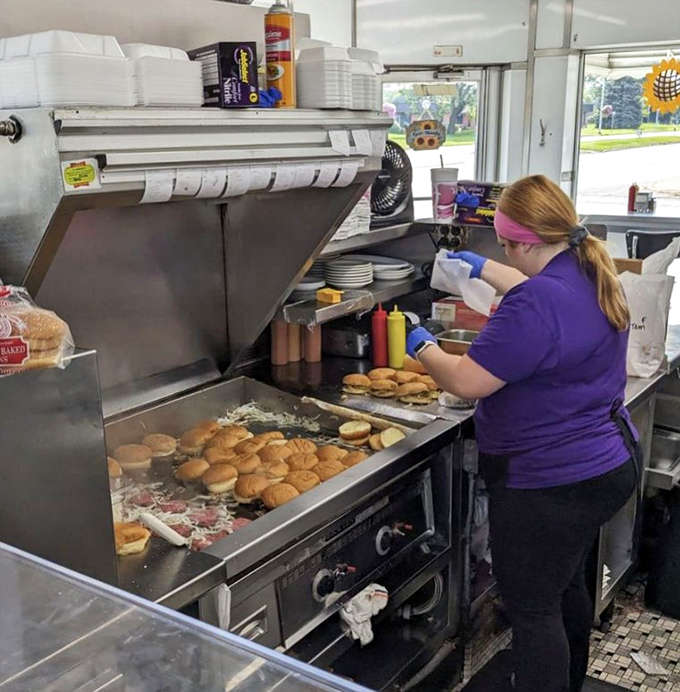 The kitchen dance is choreographed by years of experience &ndash; every spatula flip and onion scatter executed with precision.