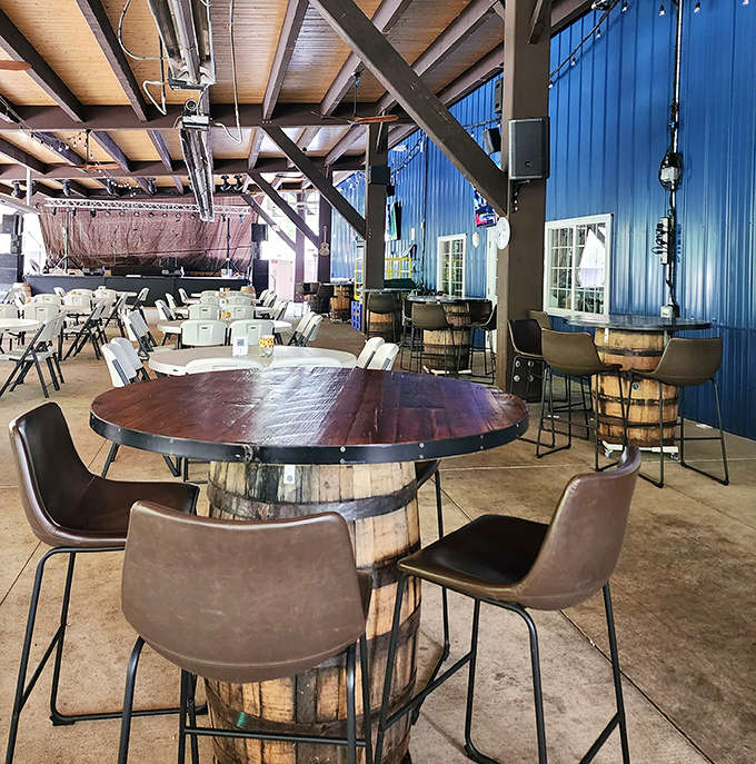 Barrel tables and comfortable seating create the perfect atmosphere for lingering conversations and leisurely tastings.