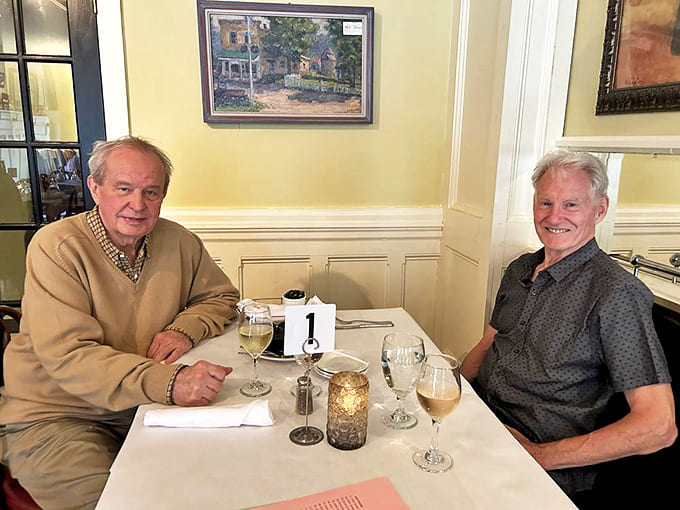 Happy diners share stories and wine at table 1, creating the kind of memories that good food and good company inevitably inspire.