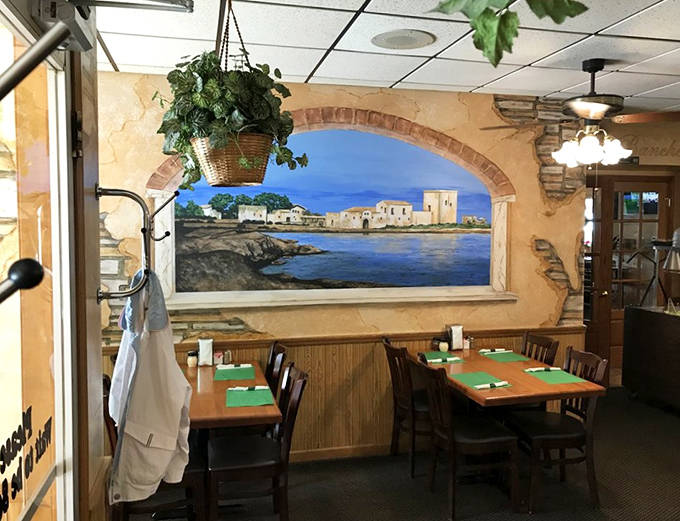 Hand-painted murals transport diners to Mediterranean coastlines, no passport or uncomfortable airplane seats required.