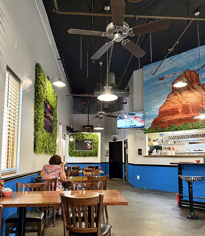 Living plant walls frame landscape photographs, bringing Sedona's natural beauty indoors while you focus on the natural beauty of your plate.