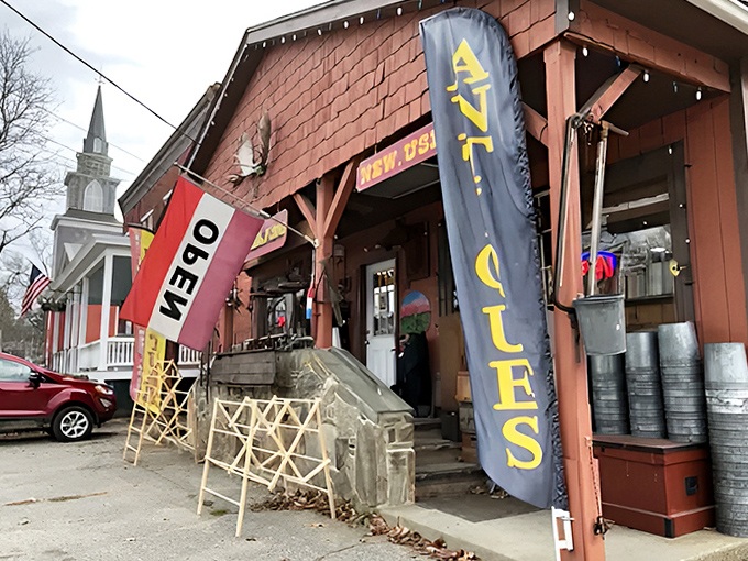 Colorful flags and weathered wood announce another treasure trove, where "OPEN" is the most welcoming word a dedicated antique hunter can find.