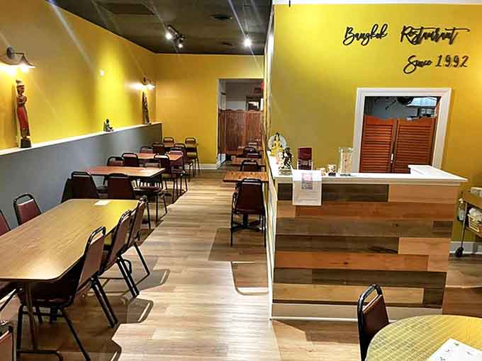 Simple yet inviting, the seating area balances functionality with touches of Thai aesthetic, creating a comfortable space to linger over every bite.