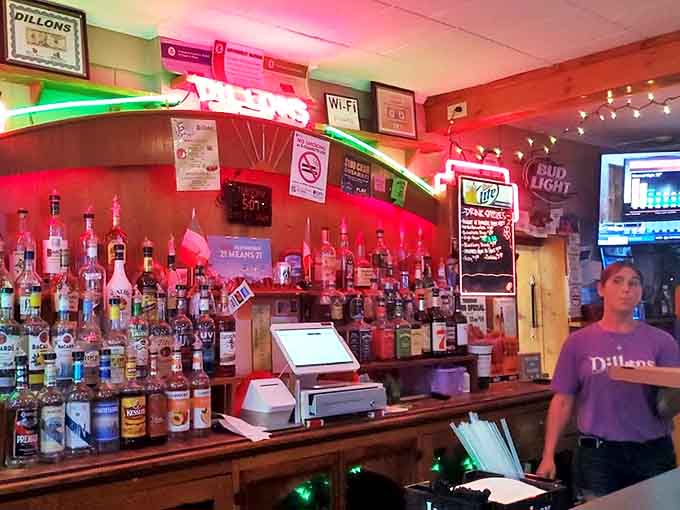 As day turns to evening, the bar comes alive with friendly banter, cold drinks, and that magical small-town hospitality.