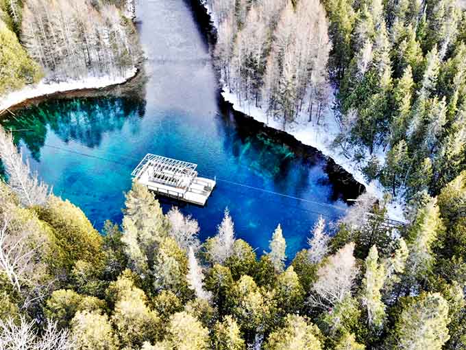 Kitch-iti-kipi's impossibly clear waters reveal an underwater world where ancient trees rest and fish dart through mineral-rich springs.