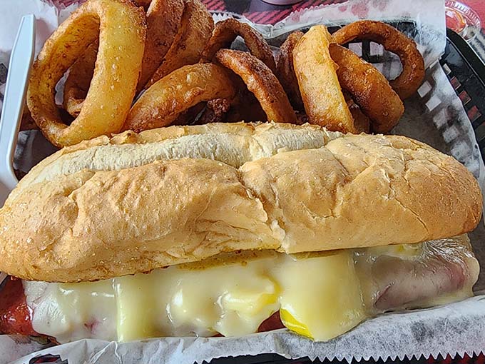 Crispy onion rings and a sandwich create the comfort food combo that's worth every delicious calorie.