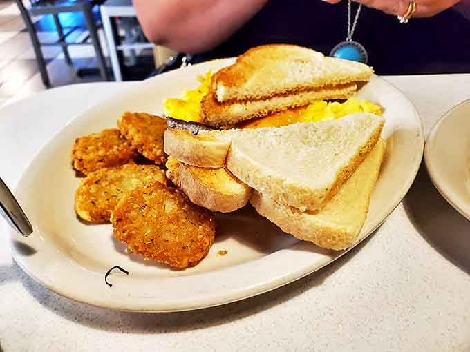 Breakfast done right &ndash; golden hash browns, perfectly toasted bread, and eggs that would make any morning person smile.