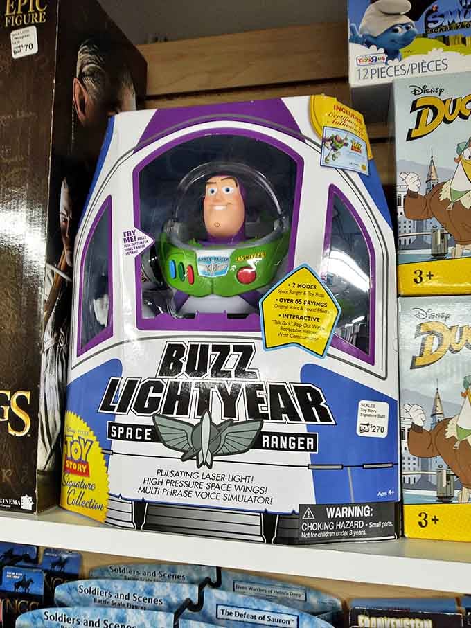 To infinity and beyond! This boxed Buzz Lightyear waits patiently for a collector to rescue him from his plastic prison.