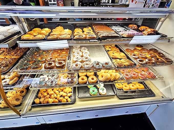 Donut heaven exists, and it looks exactly like this &ndash; rows upon rows of freshly-made treats waiting for their forever homes.