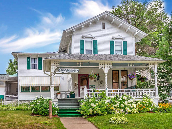 The Carriage House Bed & Breakfast welcomes guests with Victorian charm, wraparound porches, and gardens that belong in a magazine.