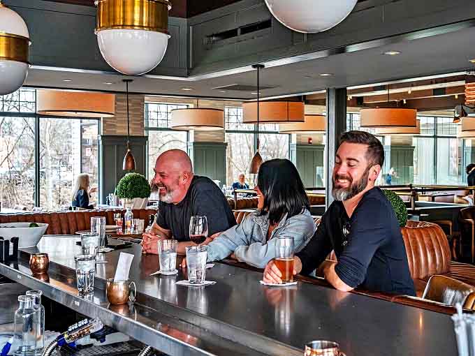 River Grille: Laughter flows as freely as the drinks at this stylish eatery, where strangers become friends over shared plates and local gossip.