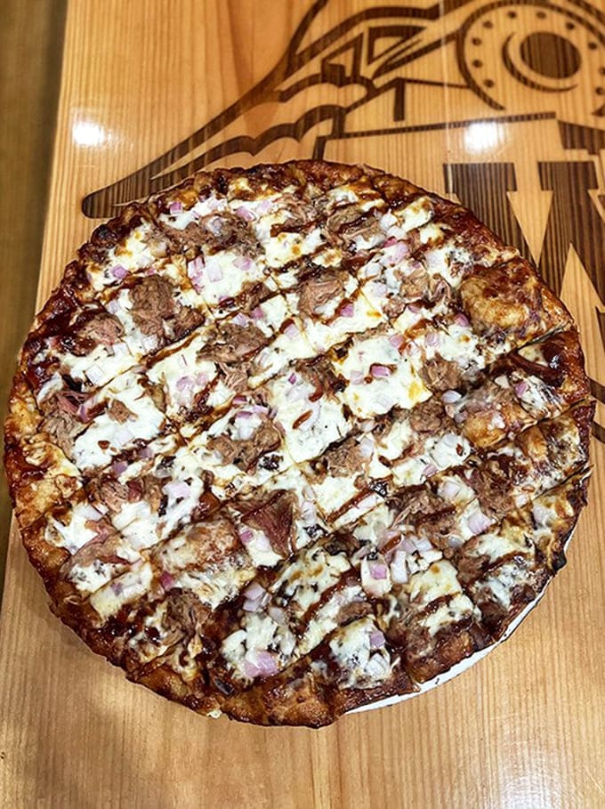 A pizza that looks like it was designed by someone who understands that cheese isn't just a topping &ndash; it's a way of life.