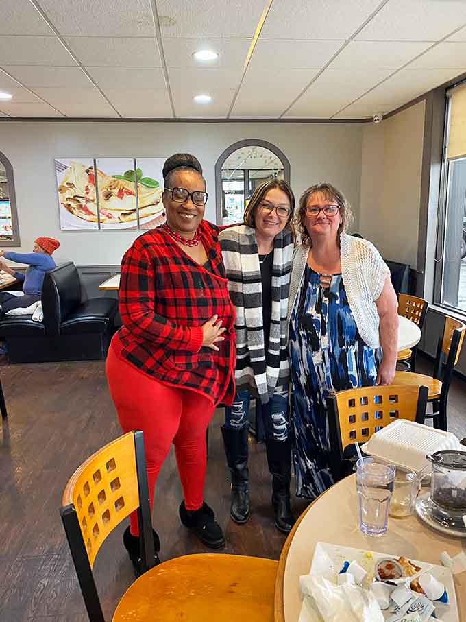 Happy diners share smiles and stories, creating the community atmosphere that makes Childers more than just a restaurant.