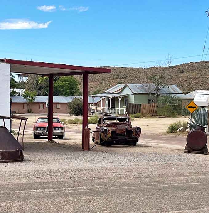 This rusted relic once represented freedom and mobility, now it's become a permanent fixture in Chloride's automotive graveyard of dreams.
