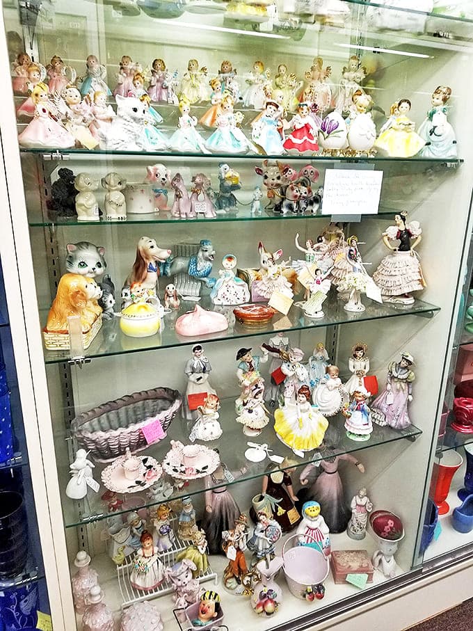 Porcelain figurines frozen in permanent elegance &ndash; tiny ambassadors from an era when curio cabinets were the Netflix of visual entertainment.