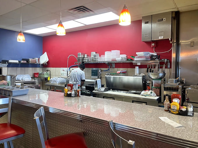 That gleaming counter and spotless kitchen equipment tell you everything you need to know about how seriously they take food here.