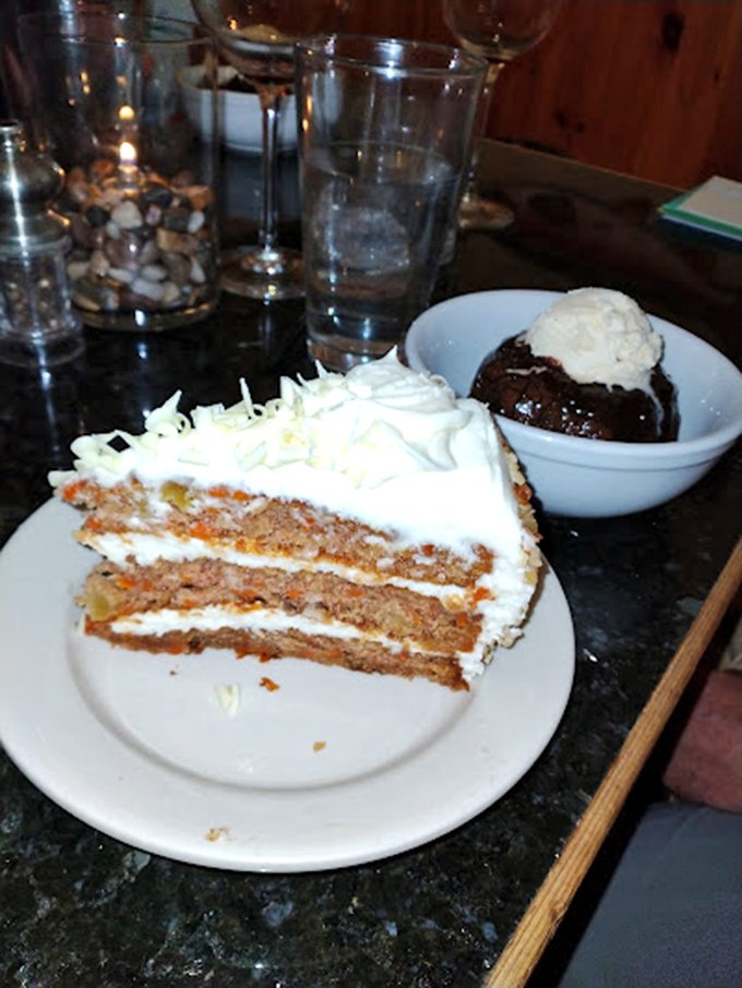 Sweet temptation on a plate, carrot cake with cloud-like frosting alongside molten chocolate cake that's worth every decadent calorie.