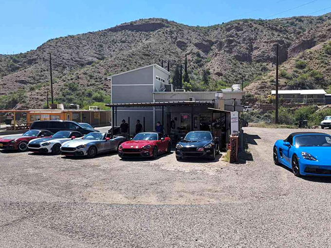 Luxury cars gather outside a modest building &ndash; in Clifton, unexpected contrasts are part of the charm that keeps visitors guessing.