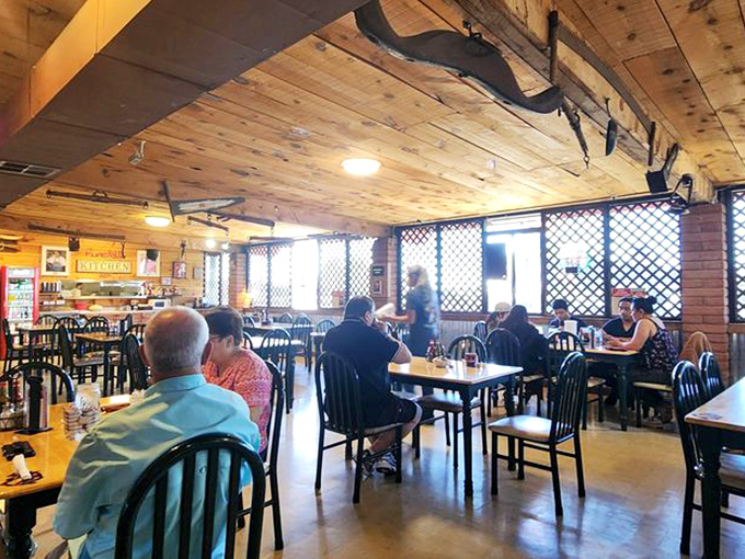 Travelers from across the globe gather in this wood-paneled dining room, united by the universal language of good food.