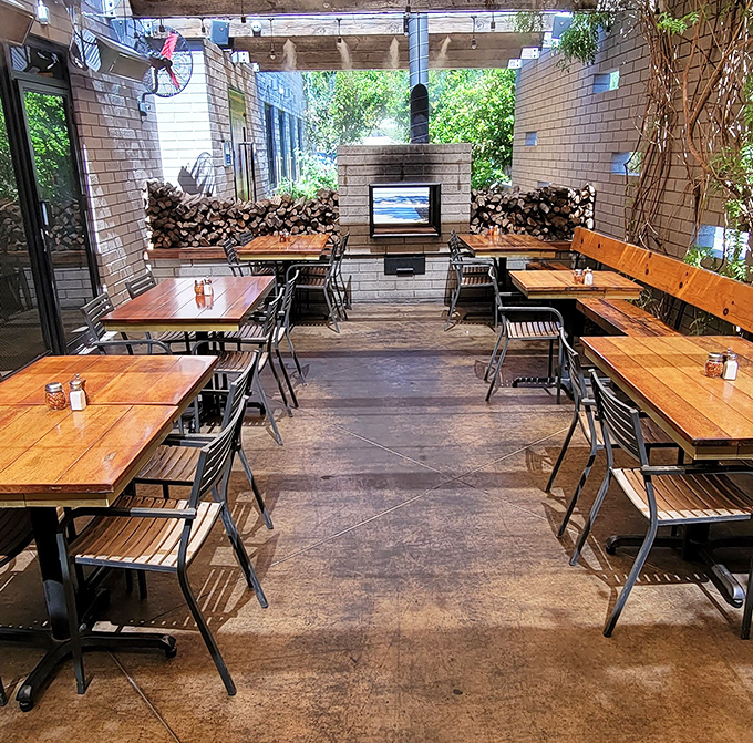 The outdoor dining space brings the Arizona landscape into the experience, with a wood-fired oven that adds both ambiance and that distinctive char to pizzas.