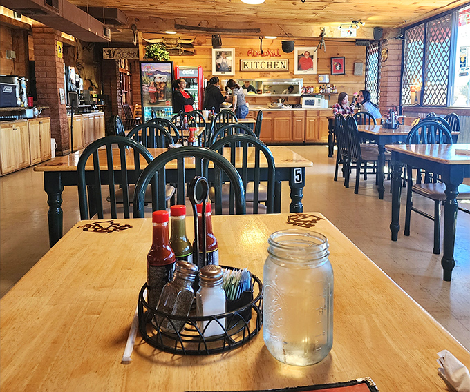 Simple table settings with condiment caddies ready for action &ndash; unpretentious dining at its finest along the Mother Road.