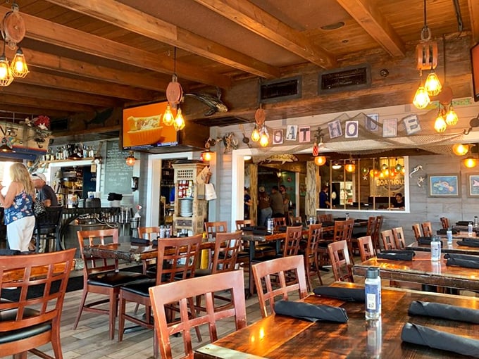 Wooden beams, warm lighting, and nautical touches create a dining room that feels like a captain's quarters&mdash;if captains had impeccable taste.