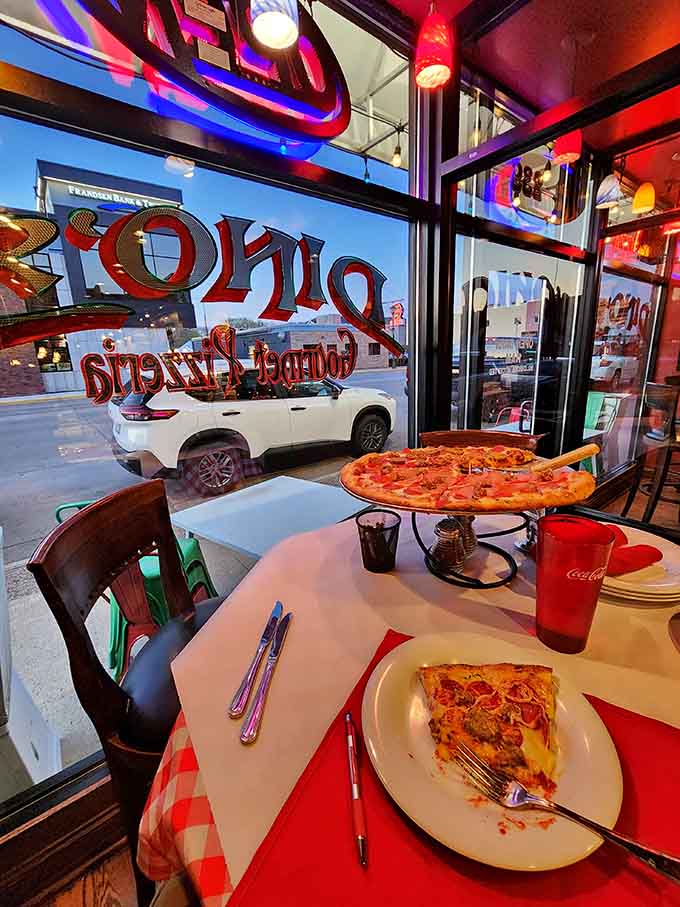 Window seats offer prime people-watching real estate while you demolish your personal pizza masterpiece.