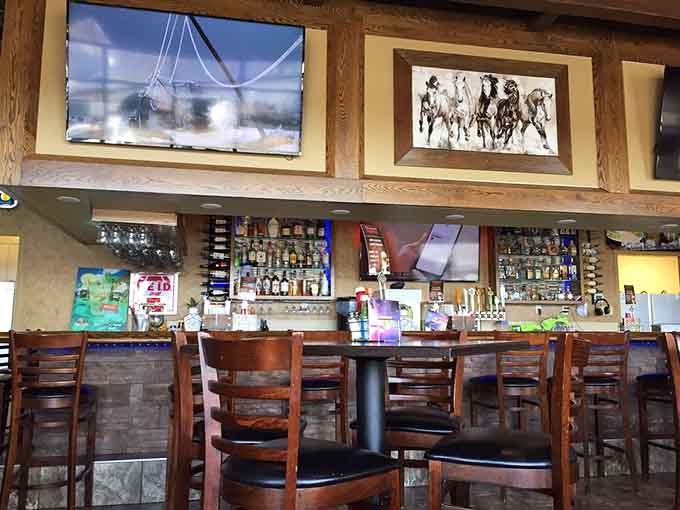 The bar area beckons with promises of perfectly mixed drinks and conversations that'll last longer than planned.