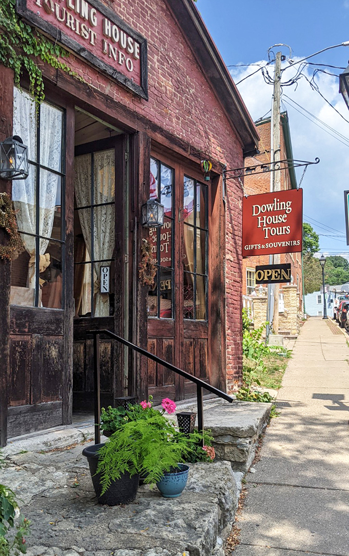 The Dowling House wears its age proudly, like wrinkles earned from a life well-lived. Those weathered doors have welcomed visitors since the 1820s.