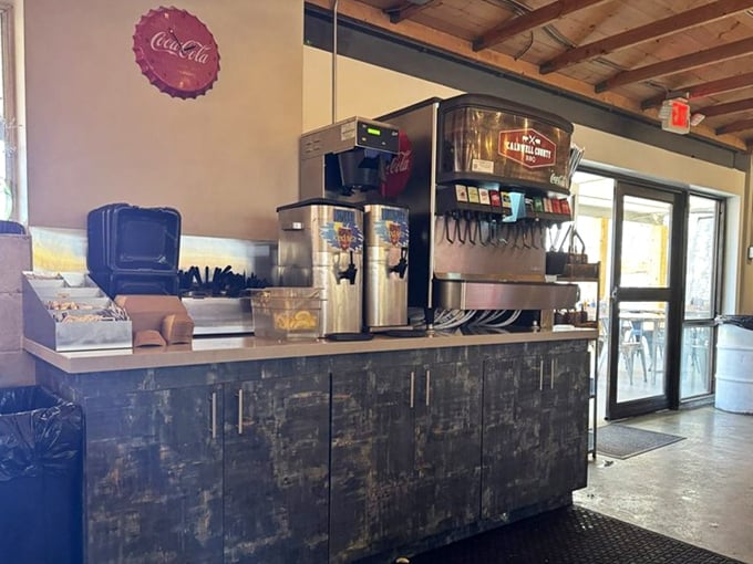 The drink station stands ready to combat the inevitable thirst that follows proper barbecue consumption &ndash; sweet tea and soda to the rescue!