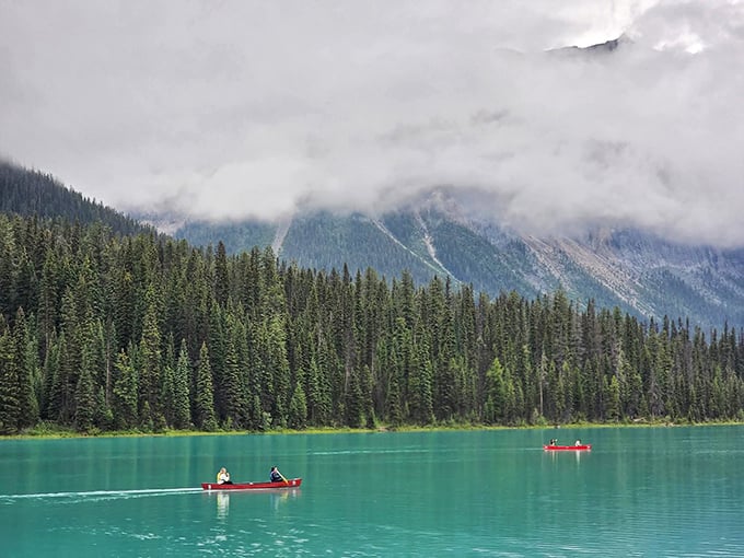 Mother Nature's masterpiece: Emerald Lake's waters glow with an otherworldly hue that photographers chase but never quite capture perfectly.