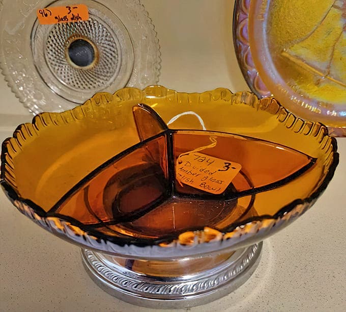 Farber Bros Krome-Kraft Amber Glass: This amber divided dish gleams with mid-century sophistication, perfect for serving nuts at your next Mad Men-inspired cocktail party.