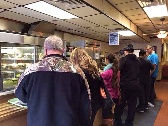 The line of happy customers tells you everything you need to know about this place's reputation in the community.