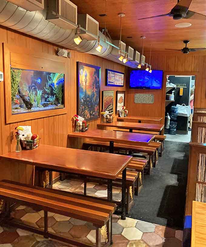 Wood-paneled walls, fish tanks, and nautical touches create an atmosphere where seafood isn't just served &ndash; it's celebrated as a way of life.