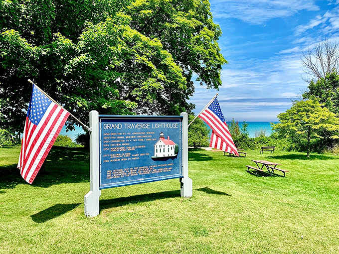 American flags frame the informational sign welcoming visitors to this historic site on Michigan's beautiful Leelanau Peninsula.
