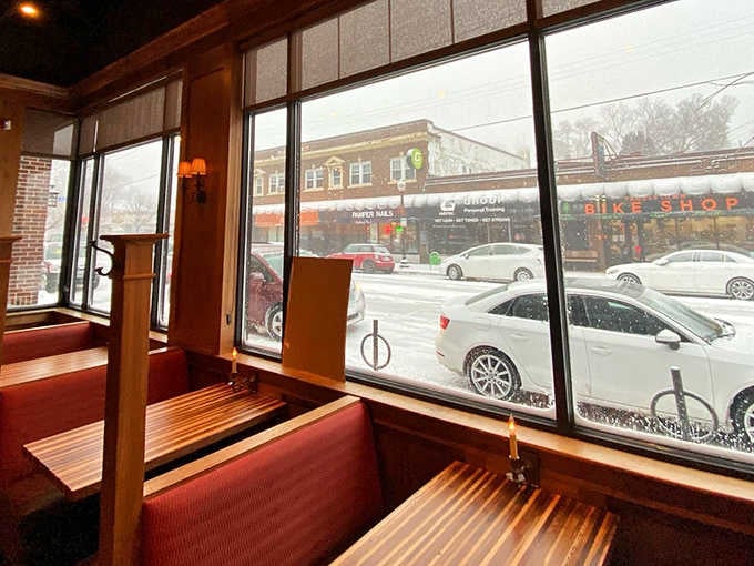 Large windows flood the space with natural light while offering views of the neighborhood this beloved pub calls home.