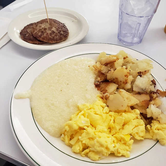 Southern meets Midwest on a plate &ndash; creamy grits, fluffy scrambled eggs, and home fries that could make a Southerner tip their hat in respect.