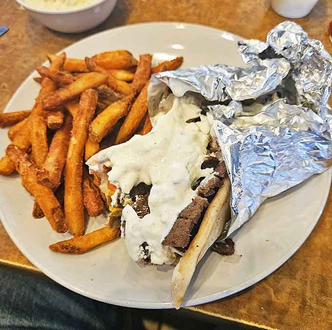 Mediterranean flavors wrapped in foil &ndash; tender meat, creamy sauce, and fresh vegetables create a handheld vacation for your taste buds.