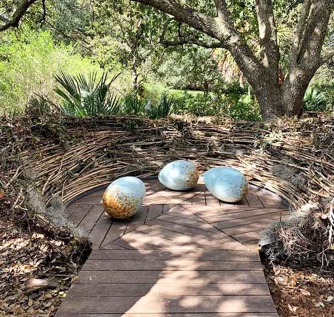 Three blue eggs nestle in a human-sized nest, proving that whimsy and wonder aren't just for children at Bok Tower Gardens.
