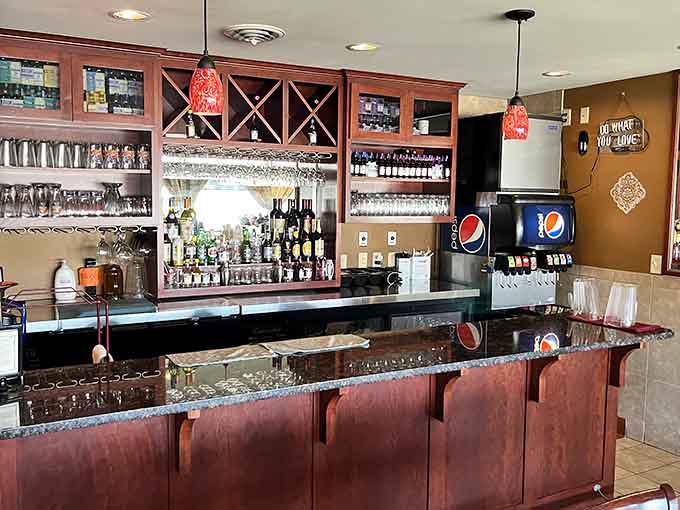 A well-stocked bar area ready to serve your favorite beverages, because sometimes you need something cold to complement all that delicious heat.