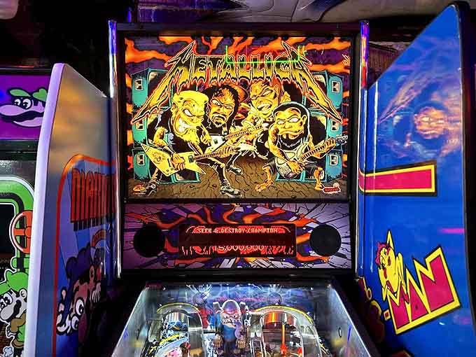 That Metallica pinball machine has witnessed more epic battles than most concert venues, with flippers flying and scores climbing.