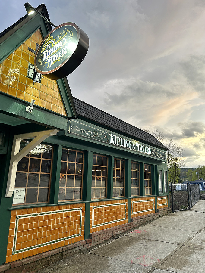 The golden glow from these windows promises craft beers, hearty meals, and conversations that flow as smoothly as the nearby river.