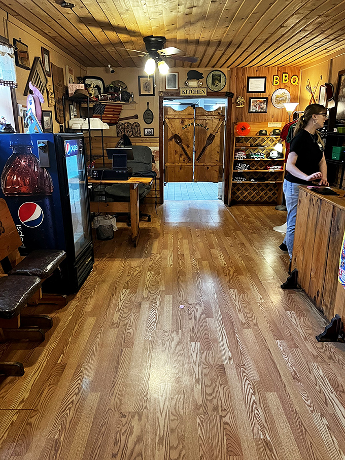 From this lobby, an unassuming cabin; inside, a temple dedicated to the art of slow-smoked perfection and community gathering.