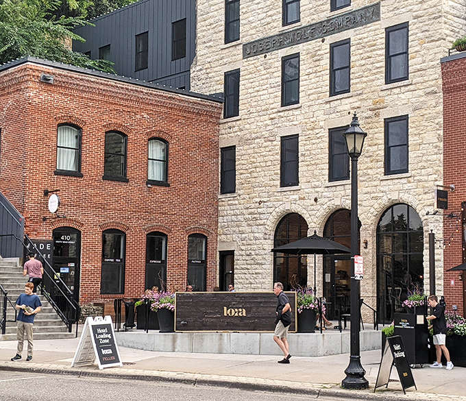 Lora Hotel blends historic stone with modern design, offering luxury accommodations where lumber barons once conducted business over whiskey.