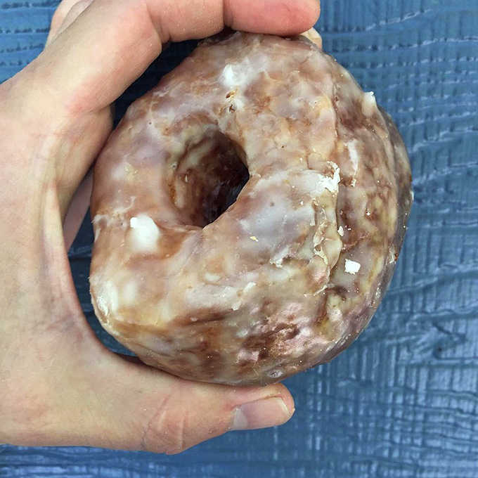 The humble glazed donut, elevated to art form &ndash; a perfect ring of fried dough that proves simplicity, when done right, is simply magnificent.