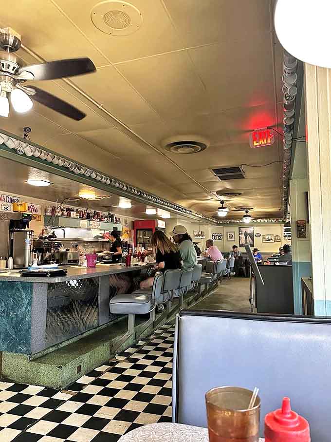The dining room buzzes with conversation and clinking silverware, creating that perfect diner atmosphere where everyone feels welcome and well-fed.